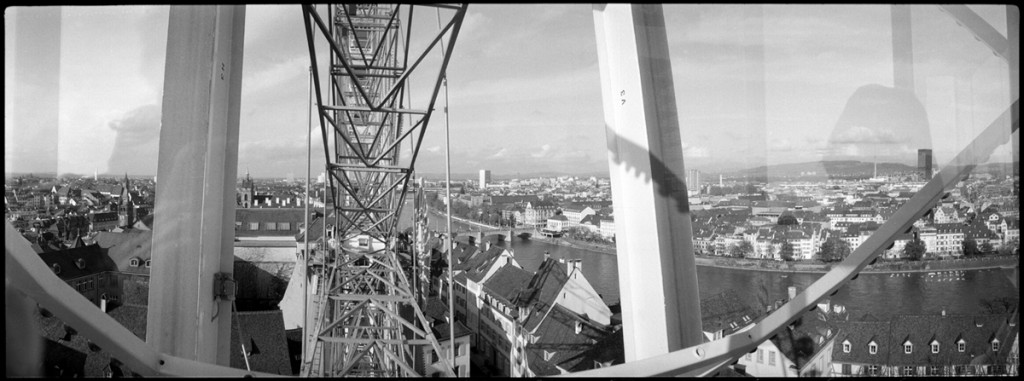 A ride on a Ferris wheel in modern Basel. The wheel, erected each ...